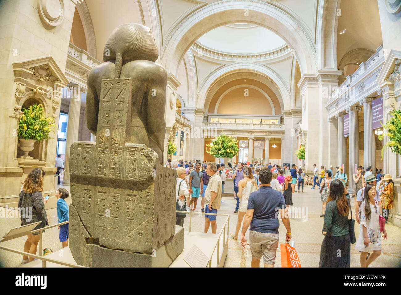 Lot of people and Tourists walk inside the Metropolitan Museum of Art ...