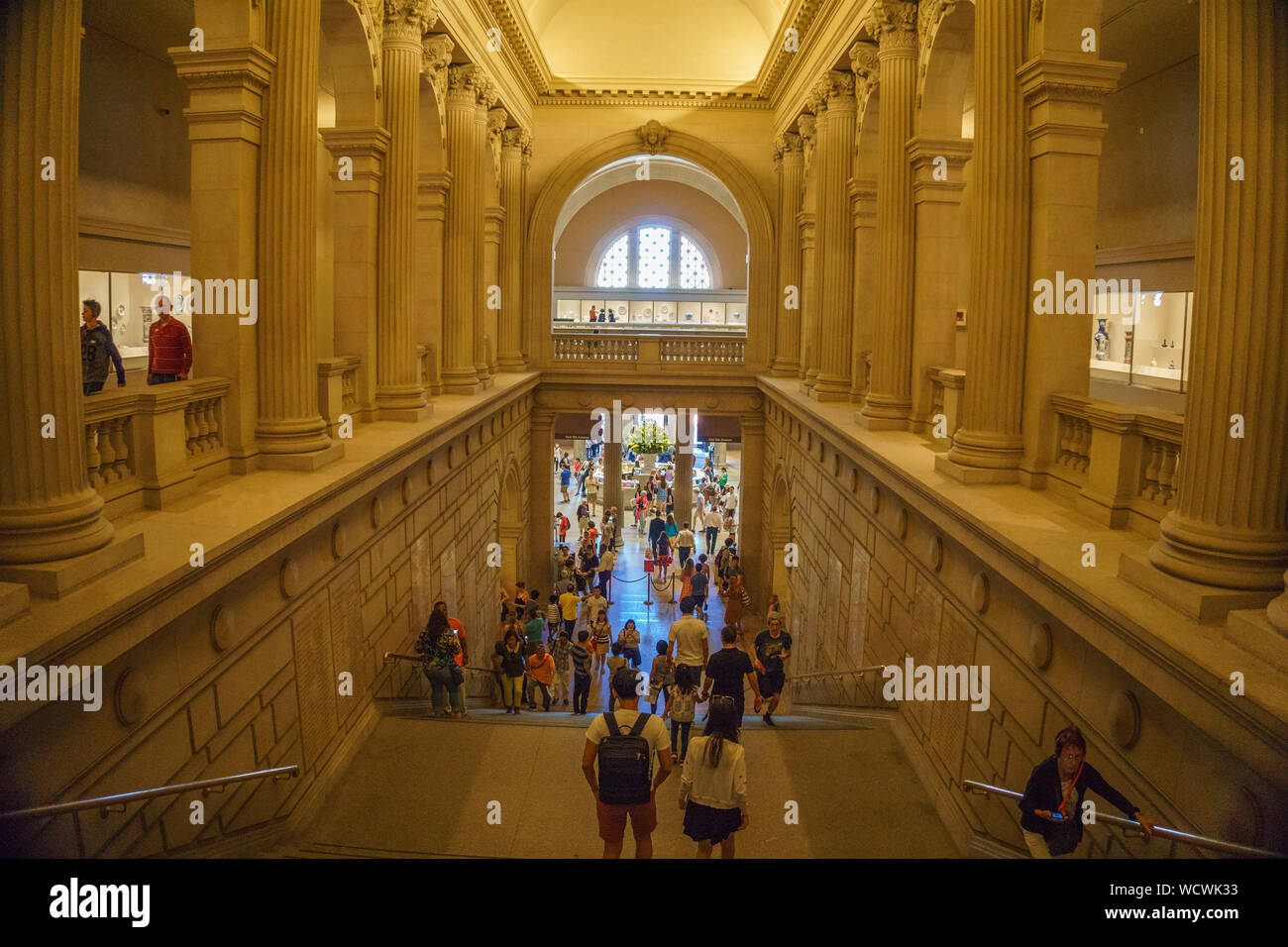 Lot of people and Tourists walk inside the Metropolitan Museum of Art ...