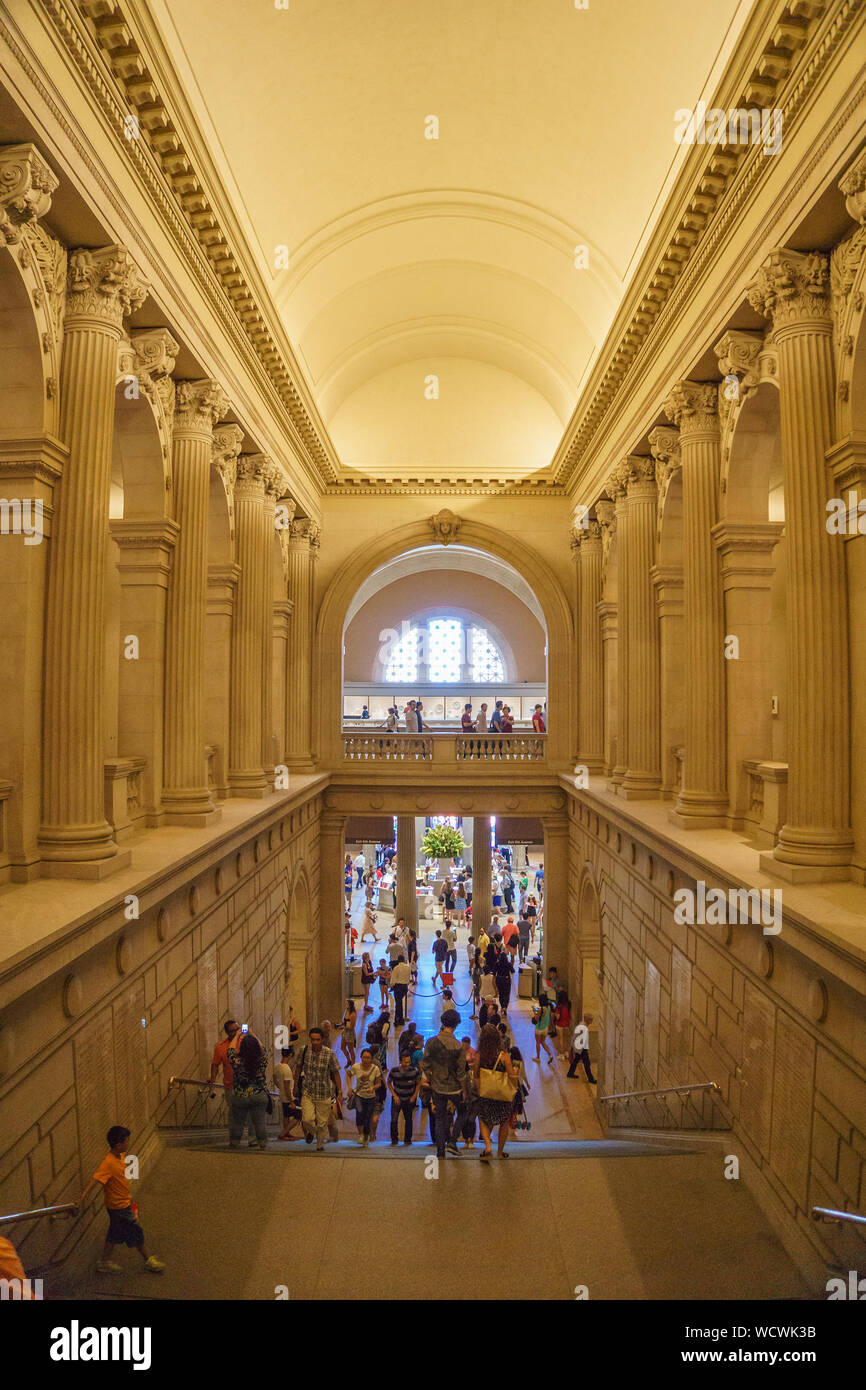 Lot of people and Tourists walk inside the Metropolitan Museum of Art ...