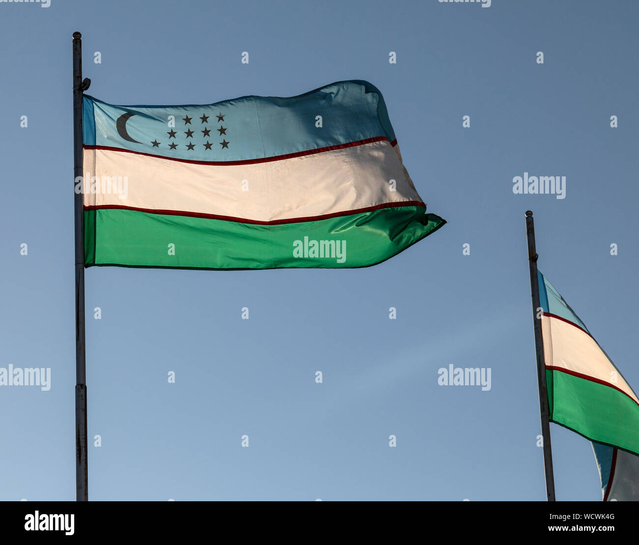 The national flag of Uzbekistan flying in the town of Khiva in ...