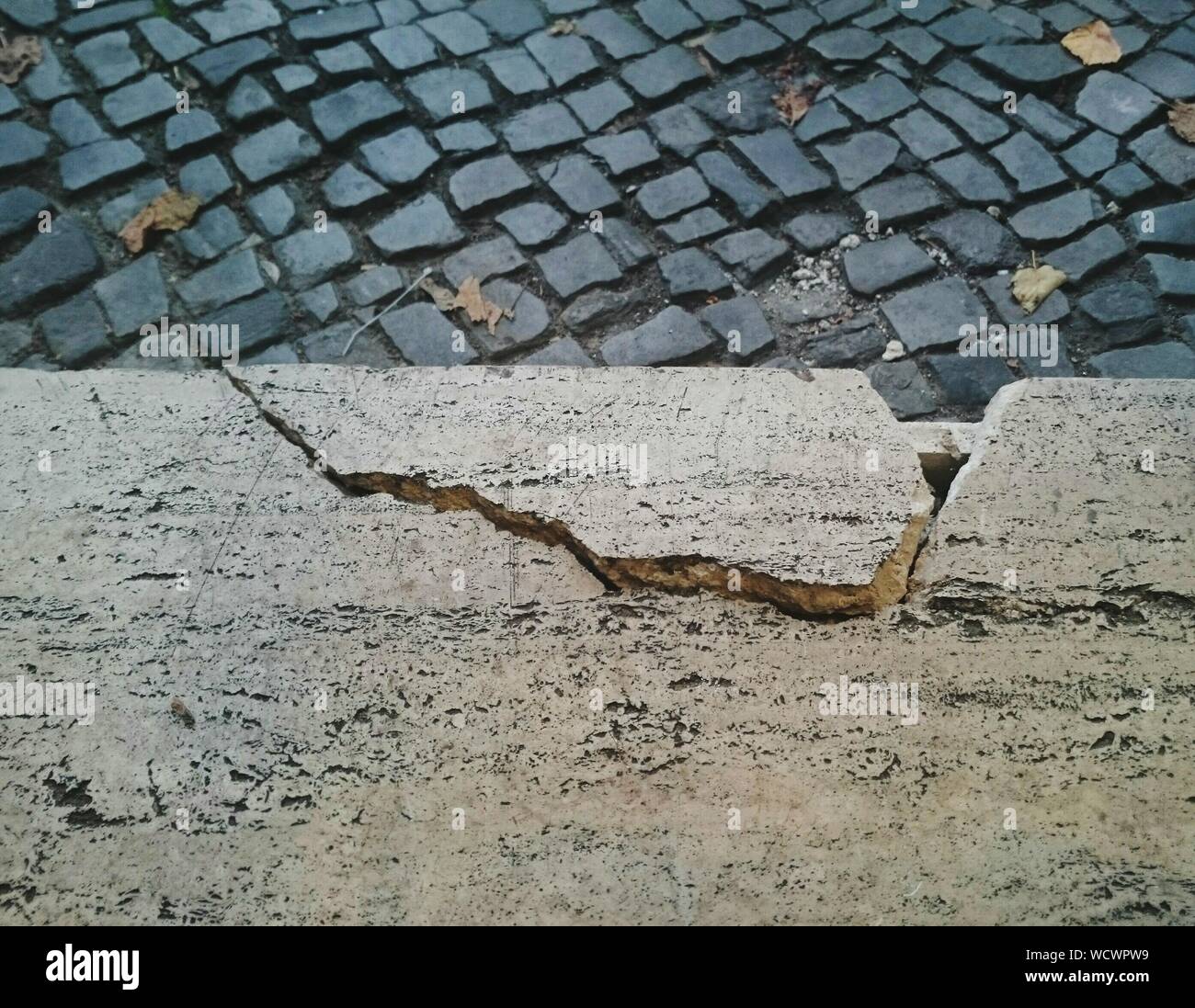 Broken sidewalk hi-res stock photography and images - Alamy
