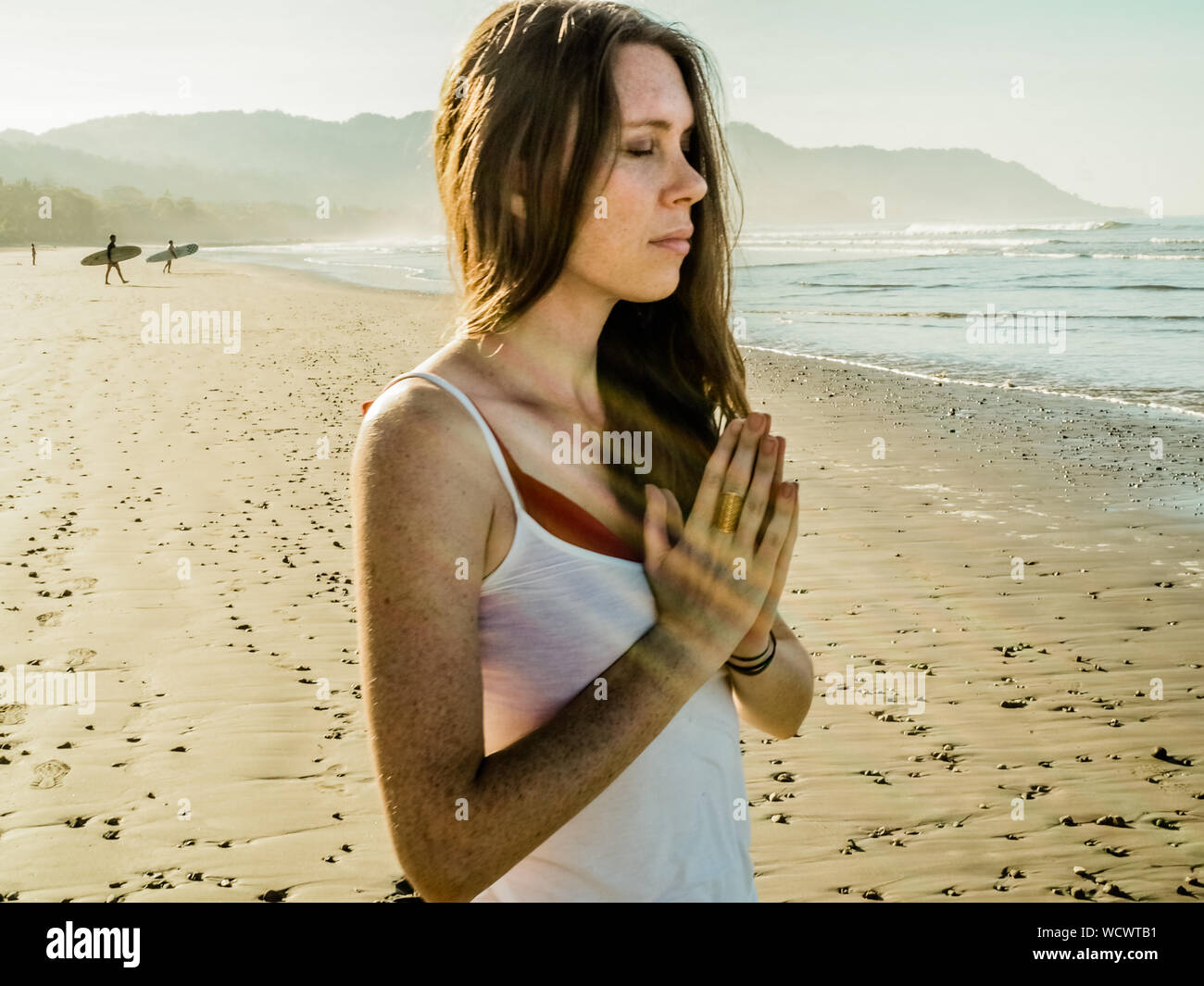 Women praying in water hi-res stock photography and images - Alamy