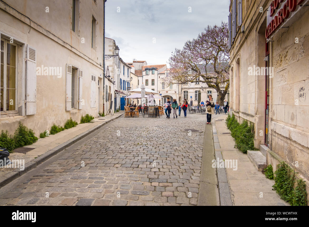 La Rochelle, France - May 07, 2019: View of a cobbled street and ...