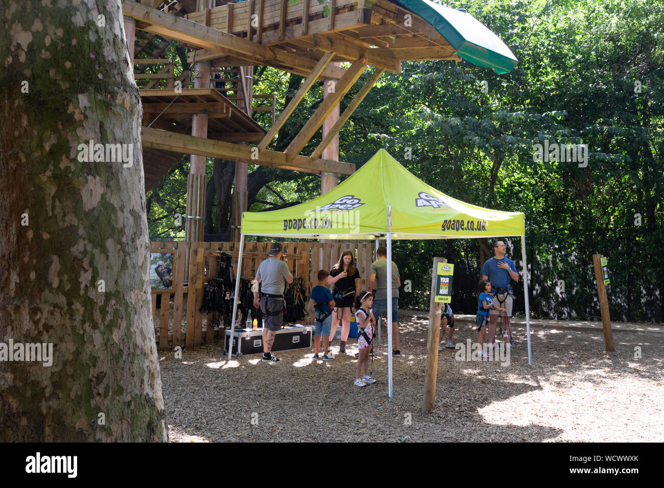 People preparing to go on a Go Ape tree top course in Battersea Park ...