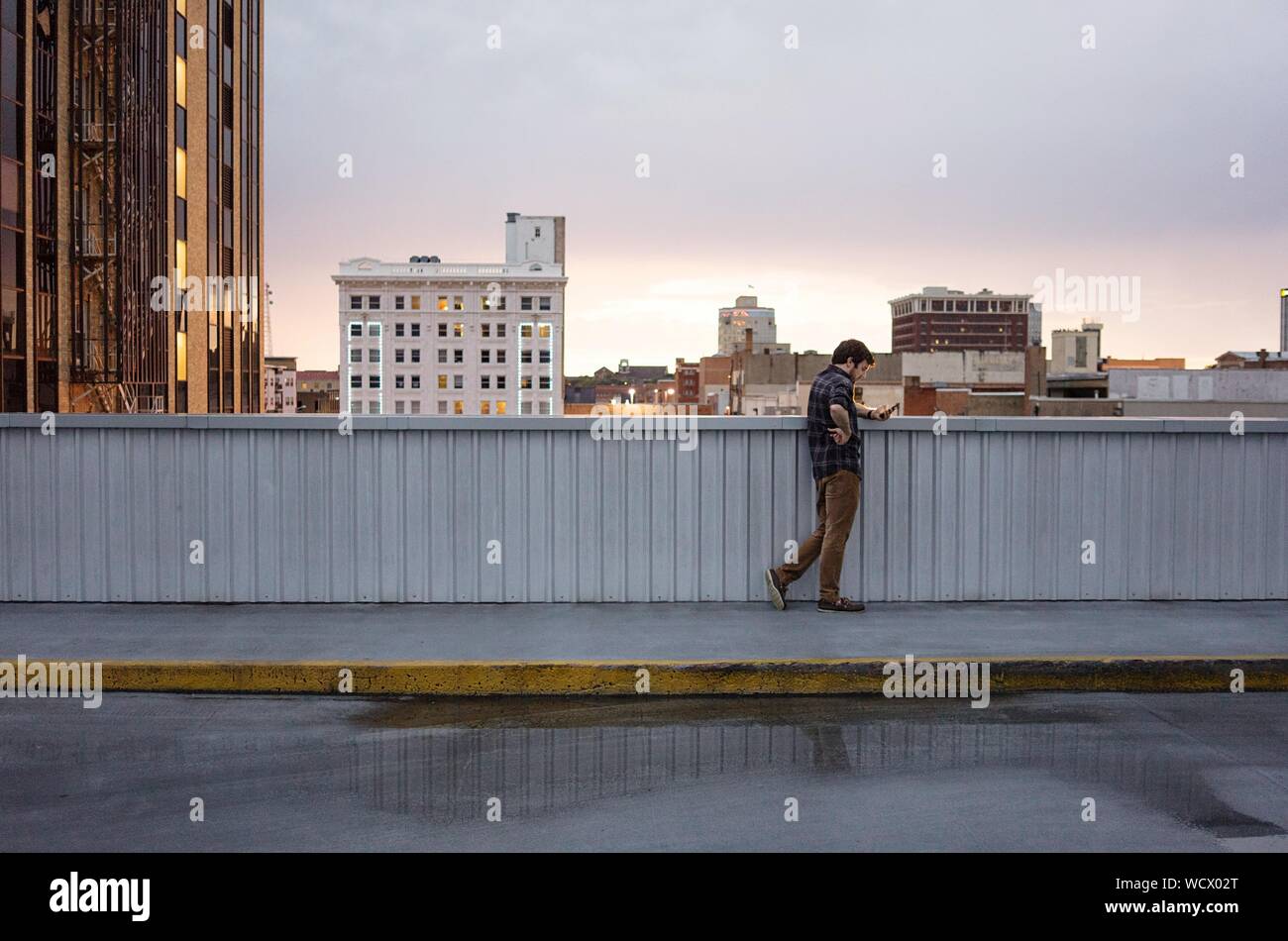 Man standing on bridge hi-res stock photography and images - Alamy