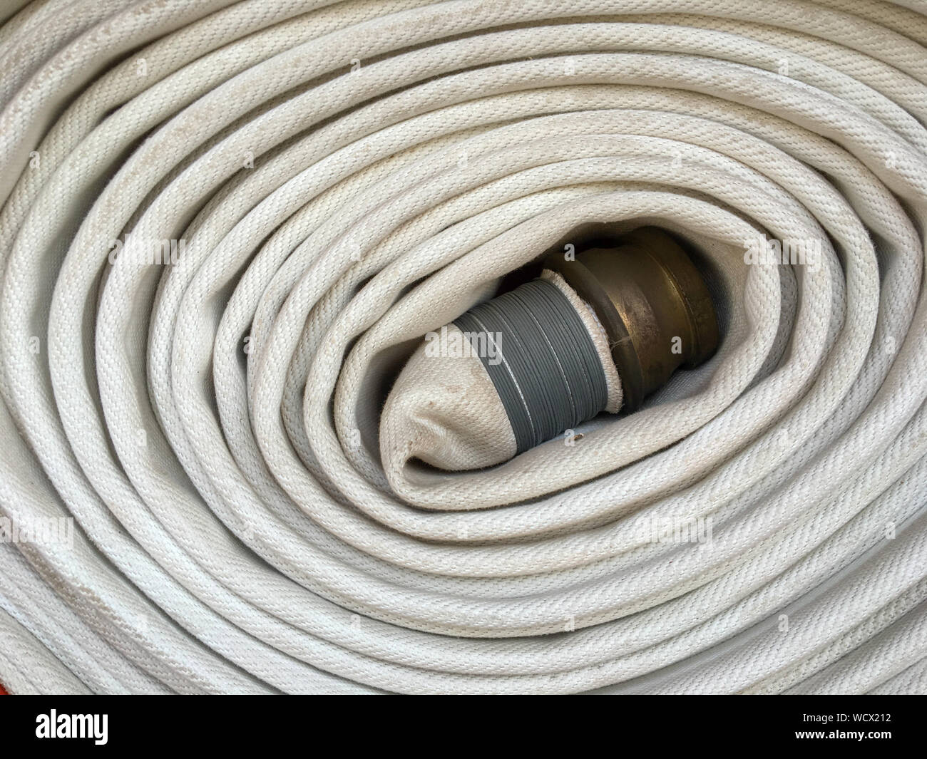 Rolled Up Fire Hose High Resolution Stock Photography and Images - Alamy