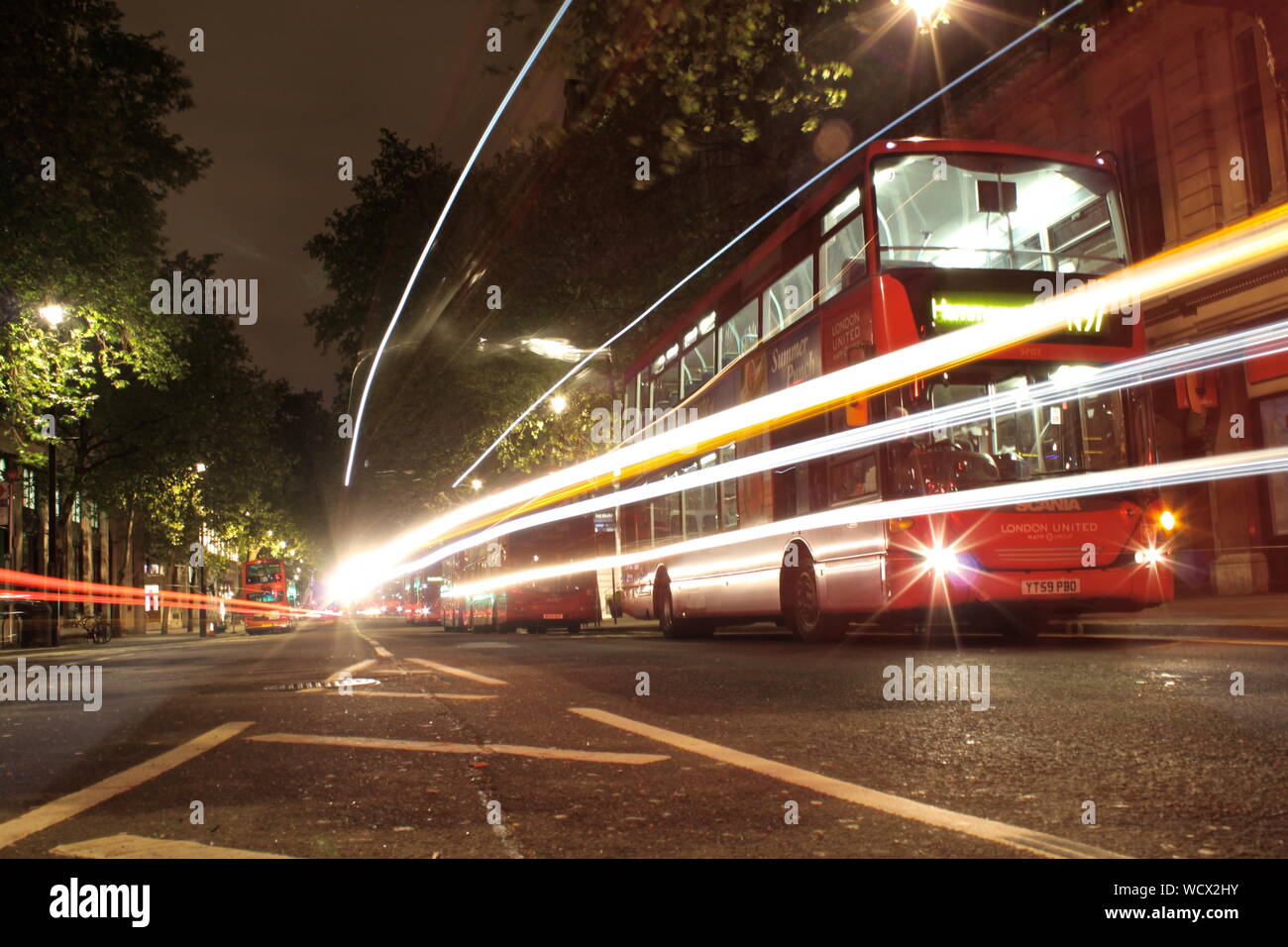 Buses at night hi-res stock photography and images - Alamy