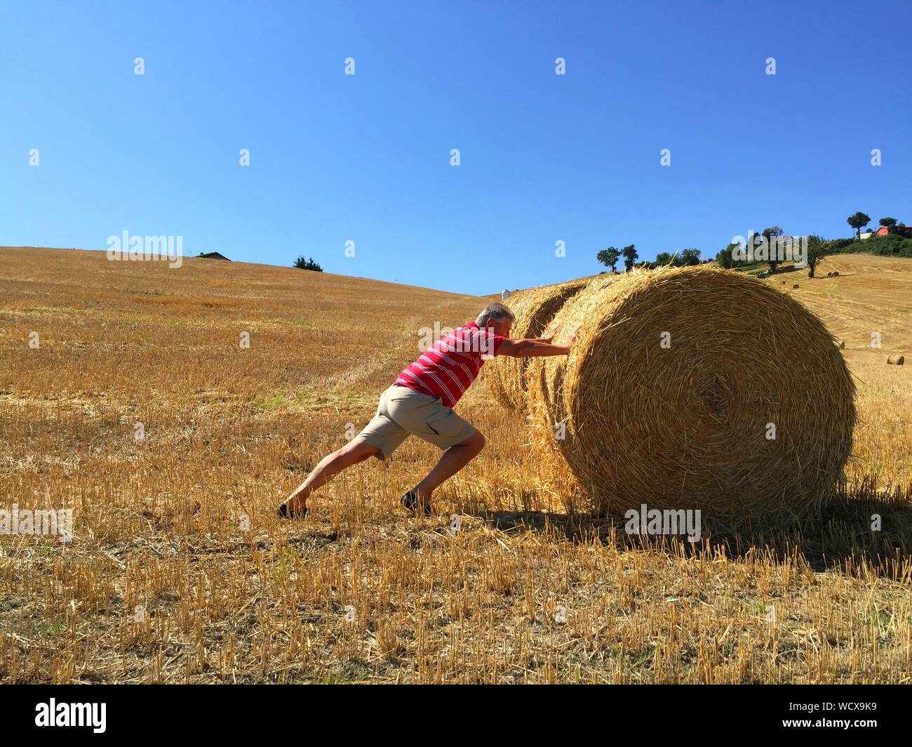 Determination man blue hi-res stock photography and images - Alamy
