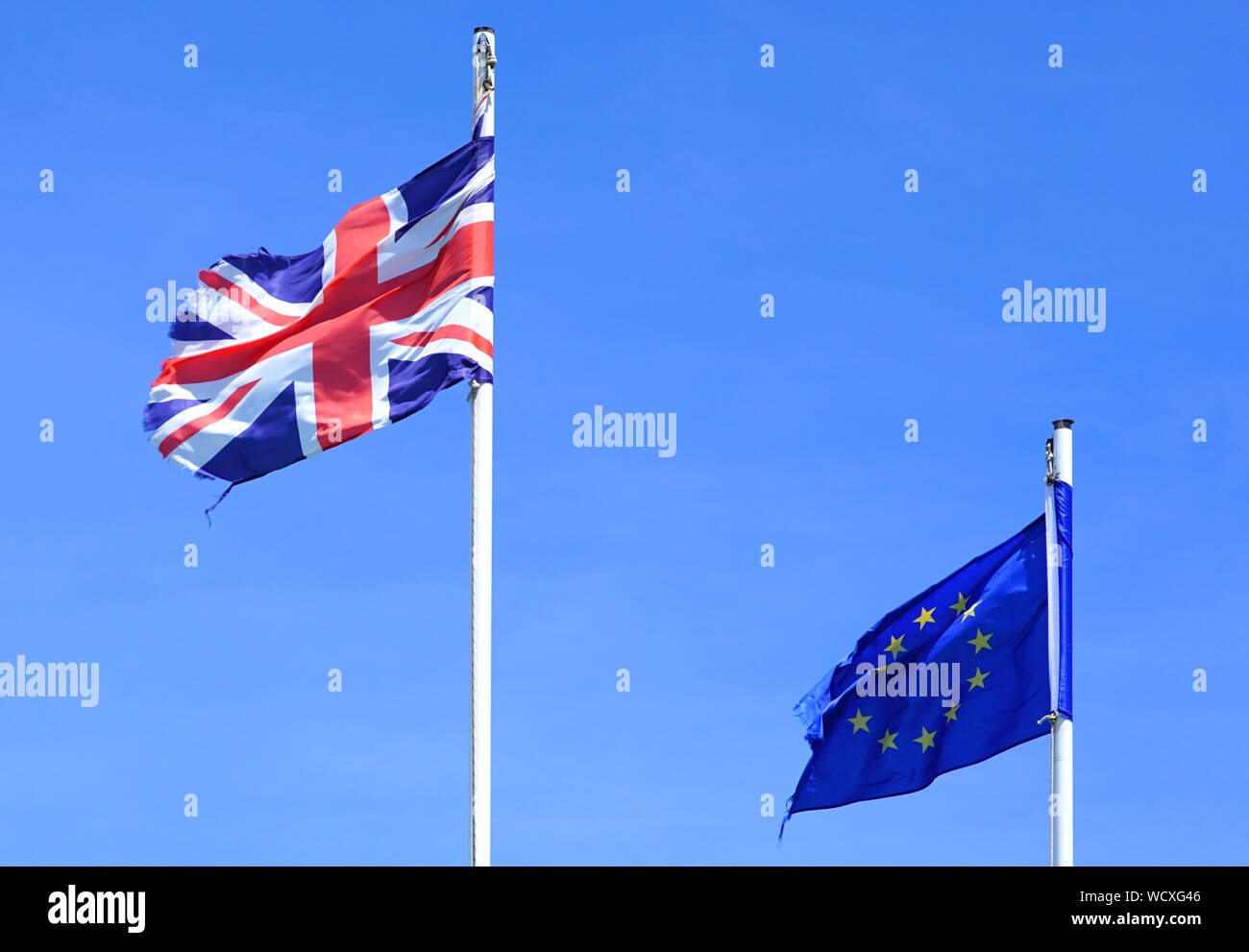 Flags of the United Kingdom and the European Union flying side by side ...
