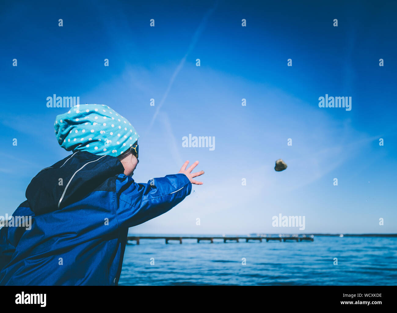 Throwing Rock In Water High Resolution Stock Photography and Images - Alamy