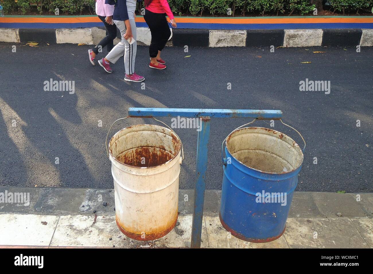 Three garbage cans hi-res stock photography and images - Alamy