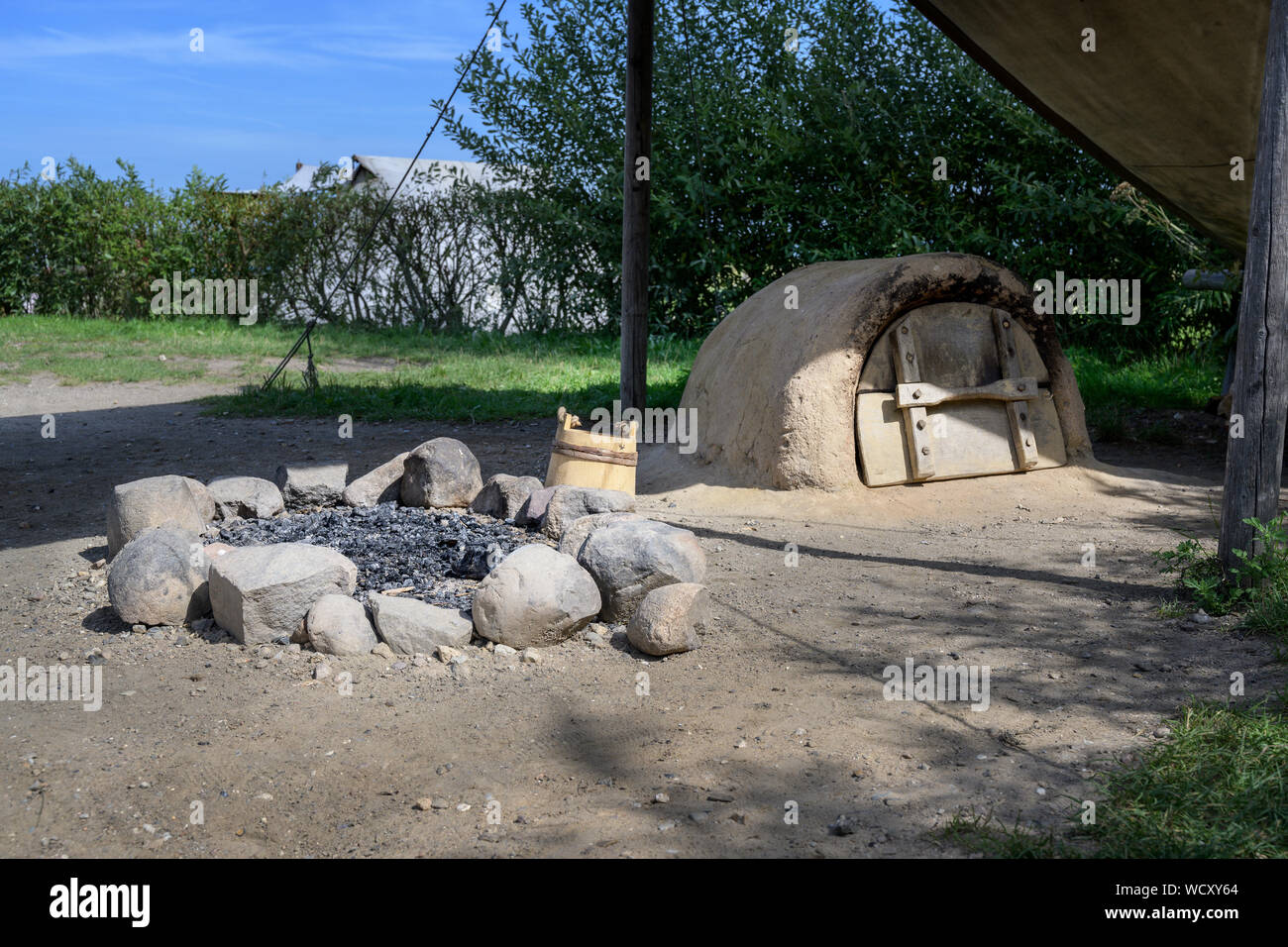 fireplace and historical clay oven in the reconstructed viking village ...