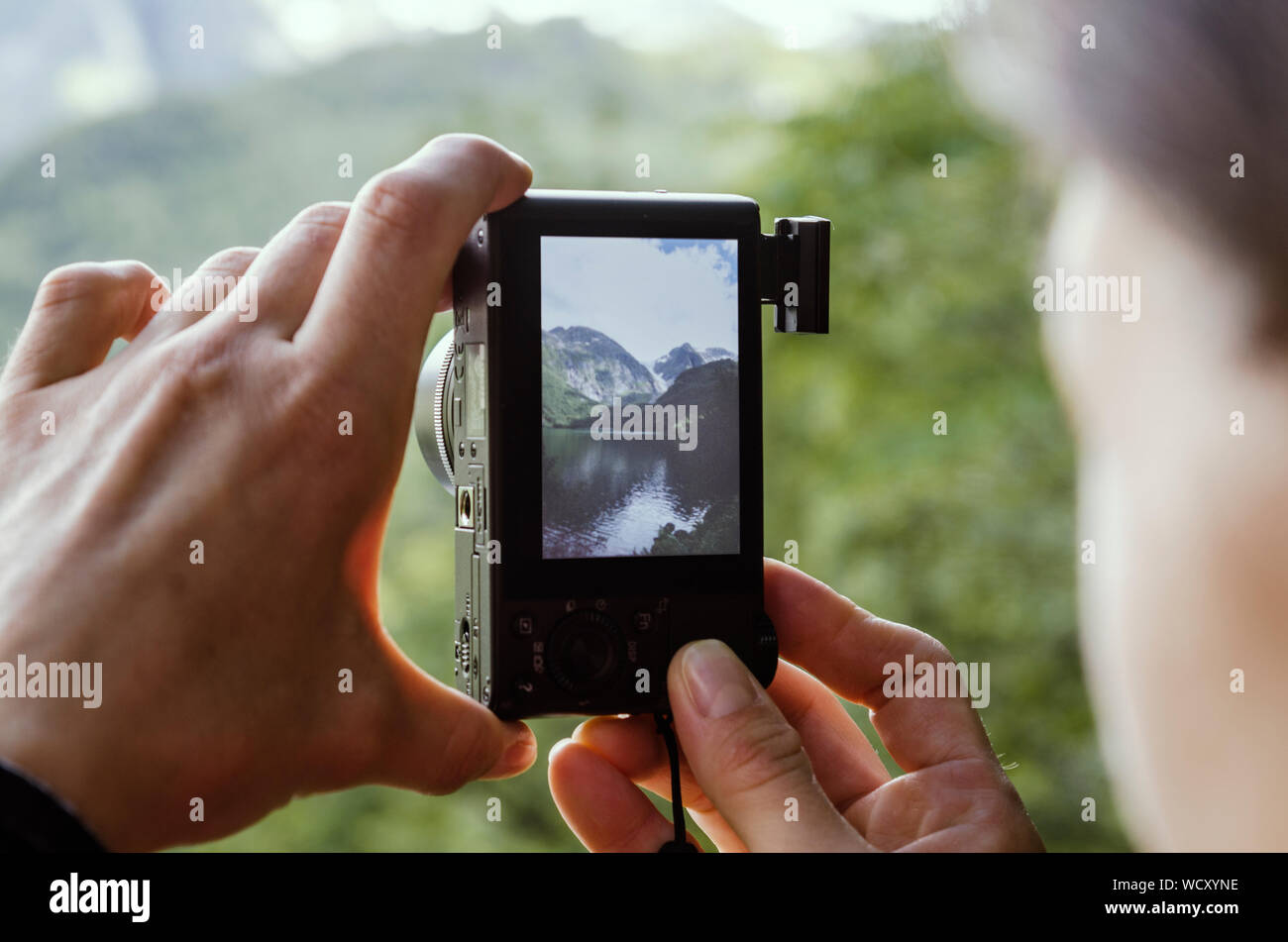 Hand holding phone to camera hi-res stock photography and images - Alamy