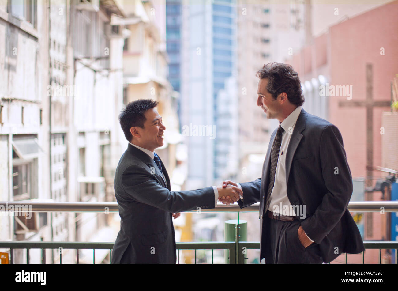 Two men talking with one another hi-res stock photography and images ...
