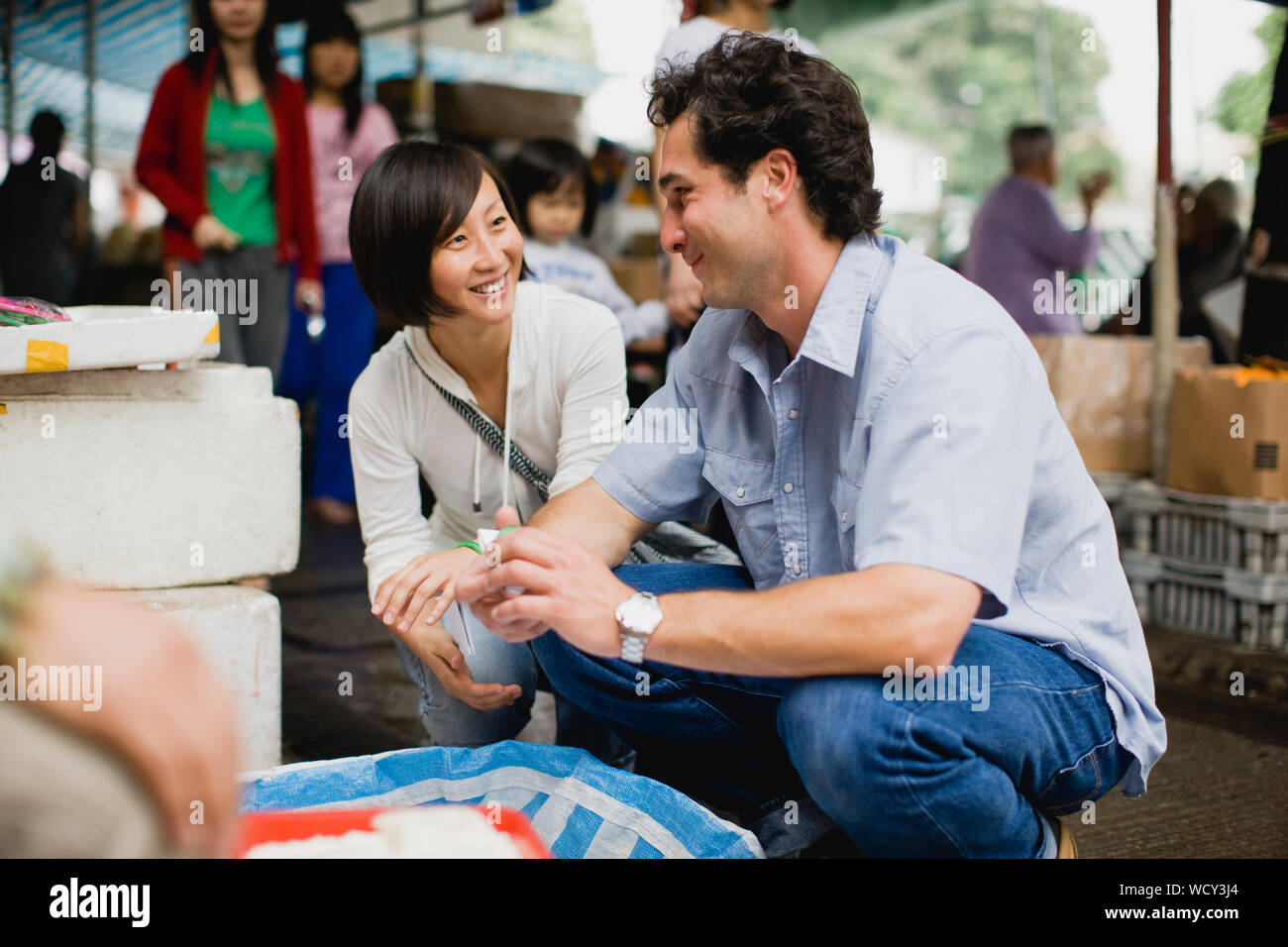 Male crouching for picture hi-res stock photography and images - Alamy