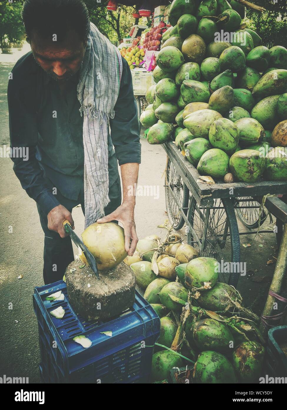 Indian coconut vendor hi-res stock photography and images - Alamy