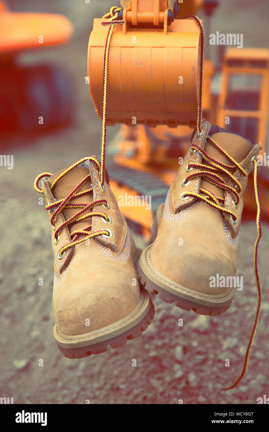 Hanging boots up hi-res stock photography and images - Alamy