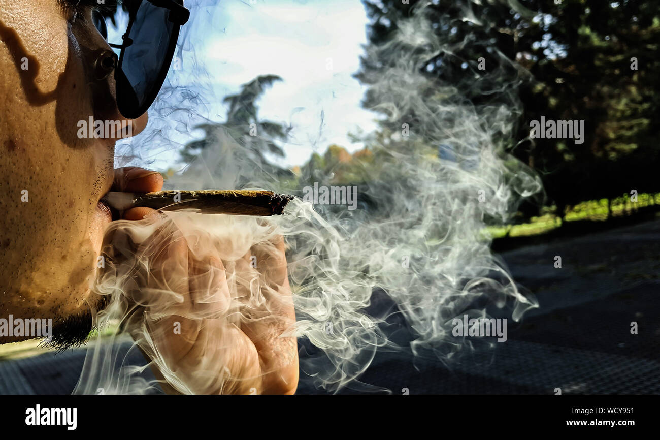 One man smoking joint hi-res stock photography and images - Alamy