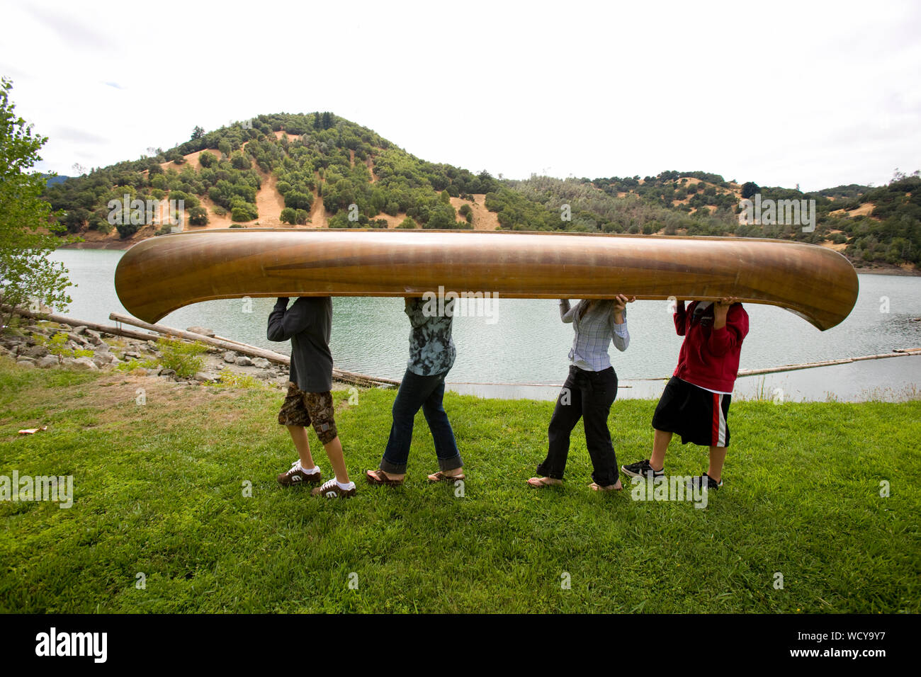 Family carrying a canoe hi-res stock photography and images - Alamy