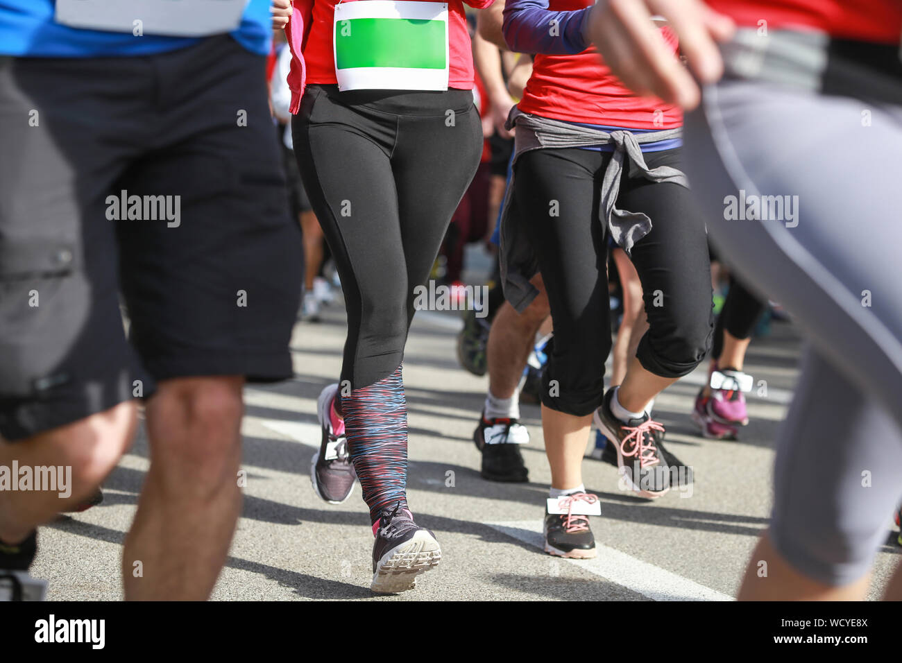 A front view of people running at the half marathon event Stock Photo ...