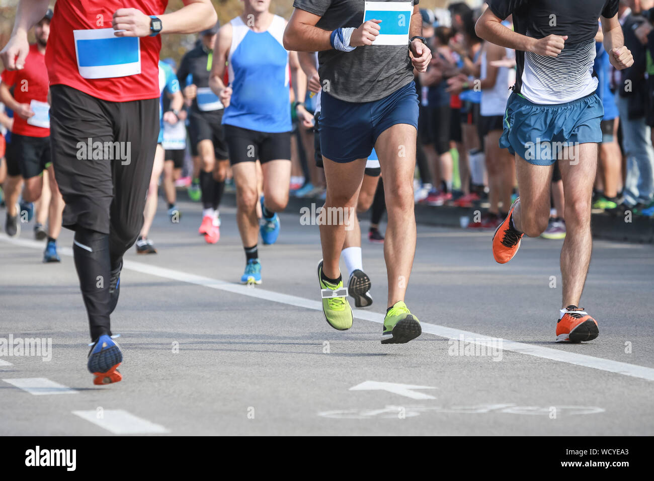 A front view of people running at the half marathon event Stock Photo ...