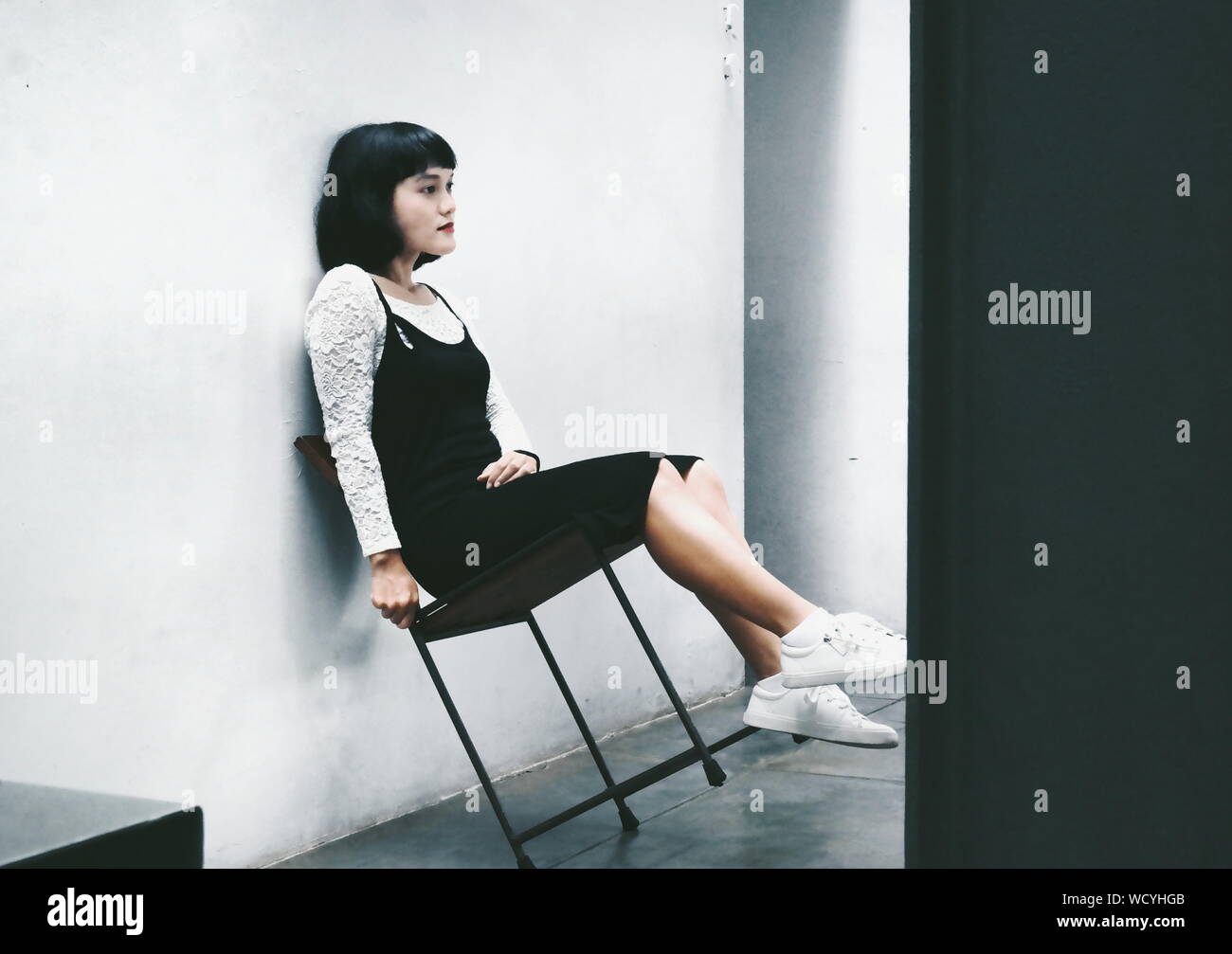 Woman Balancing Chair High Resolution Stock Photography and Images - Alamy