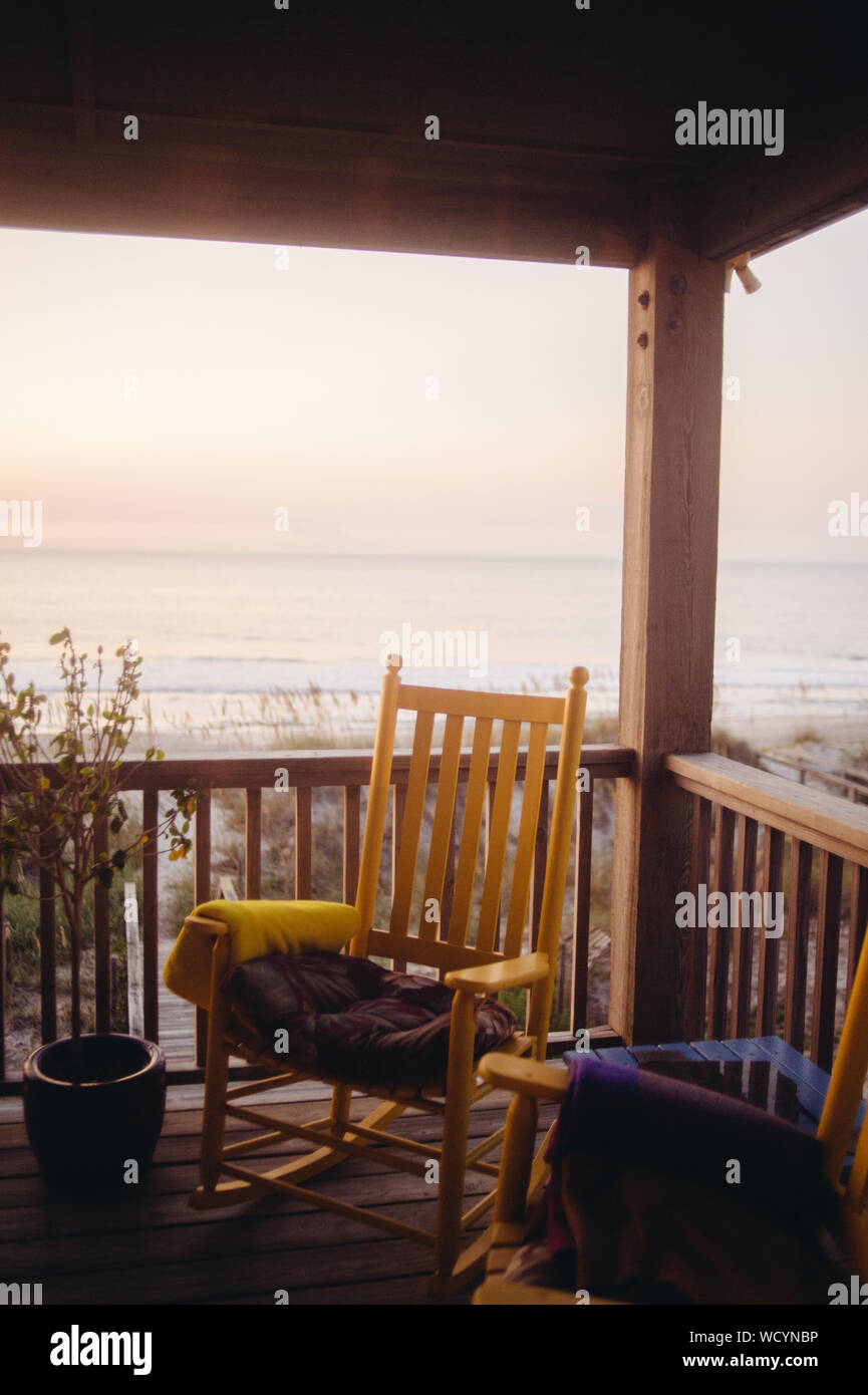 Rocking chairs by the beach hi-res stock photography and images - Alamy