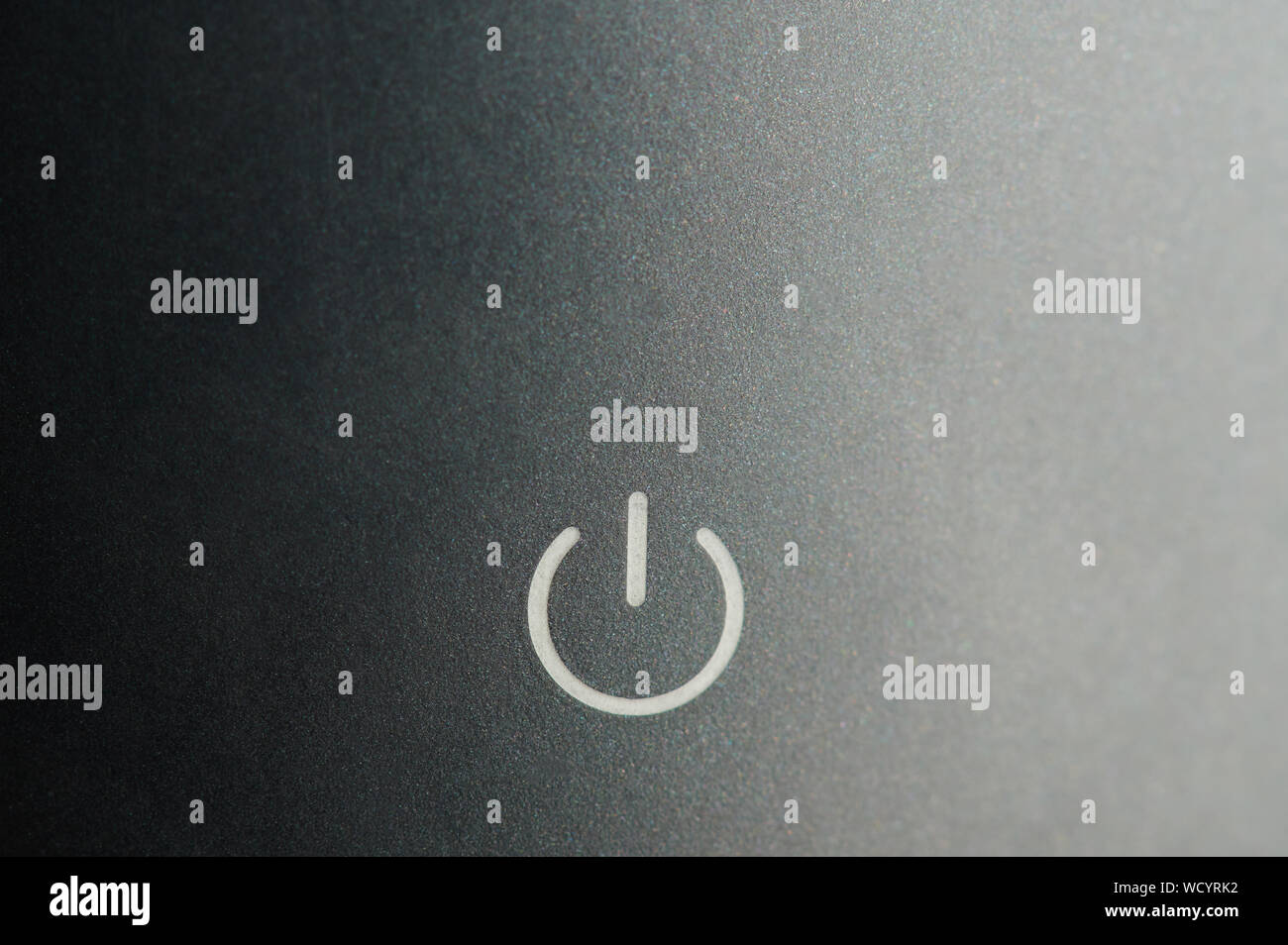 Power button on grey metal background macro close up view Stock Photo ...