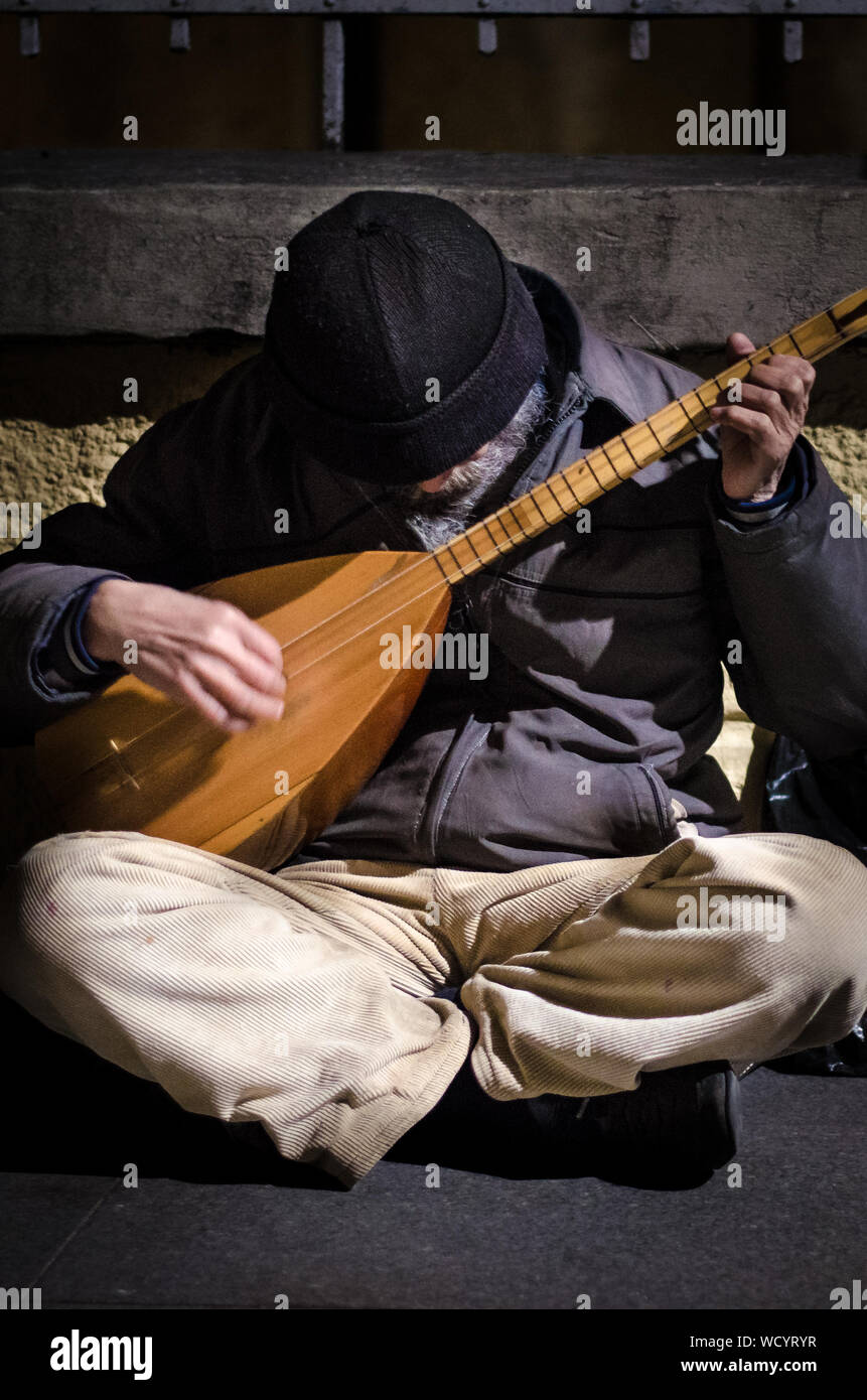 Playing baglama hi-res stock photography and images - Alamy