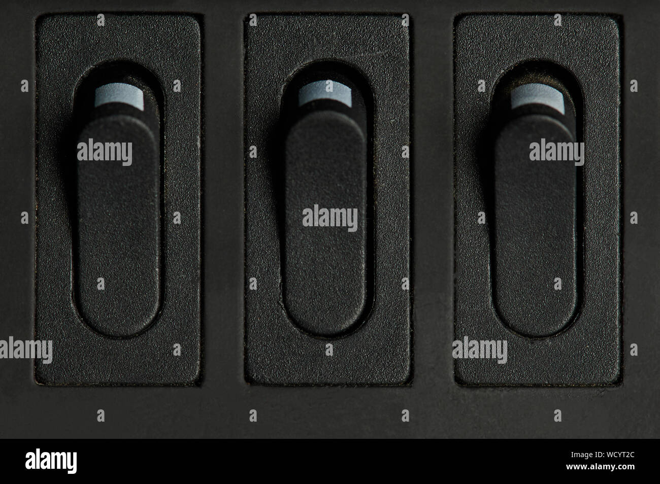 Set of dark plastic switch macro close up view Stock Photo - Alamy