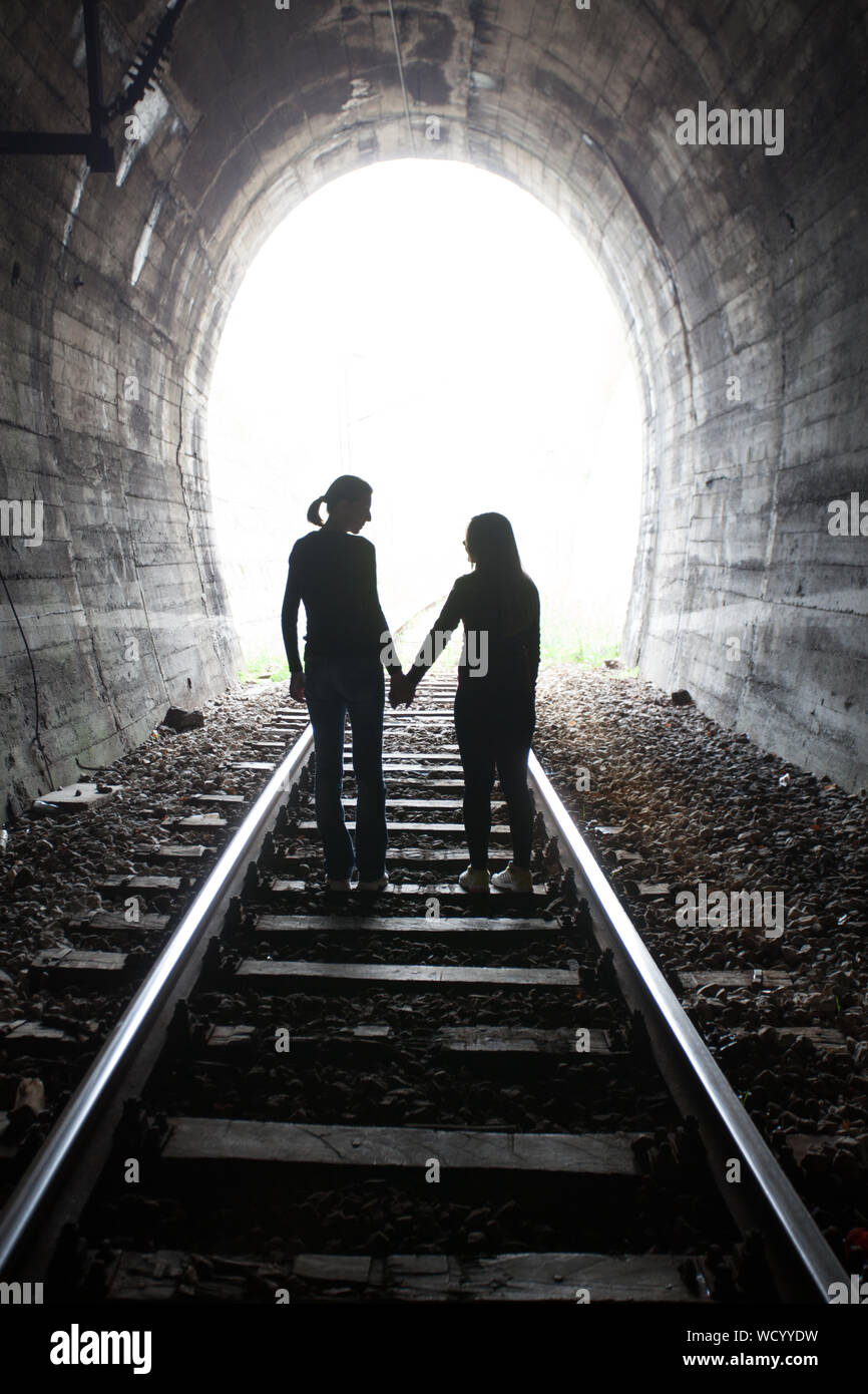 Hands holding rail hi-res stock photography and images - Alamy