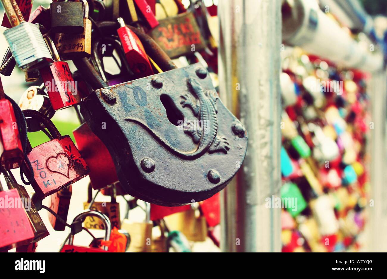 Love lock attached railing hi-res stock photography and images - Alamy