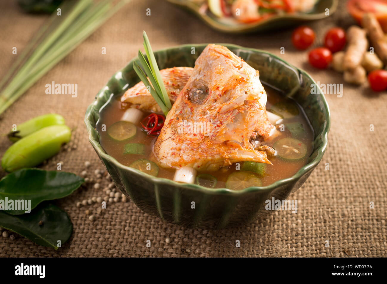 Fish head soup hi-res stock photography and images - Alamy