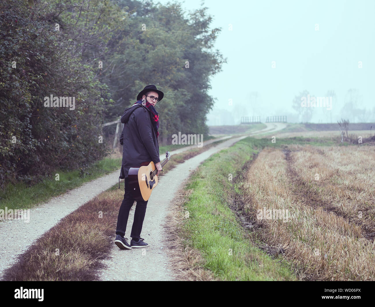Man walking on country road hi-res stock photography and images - Alamy