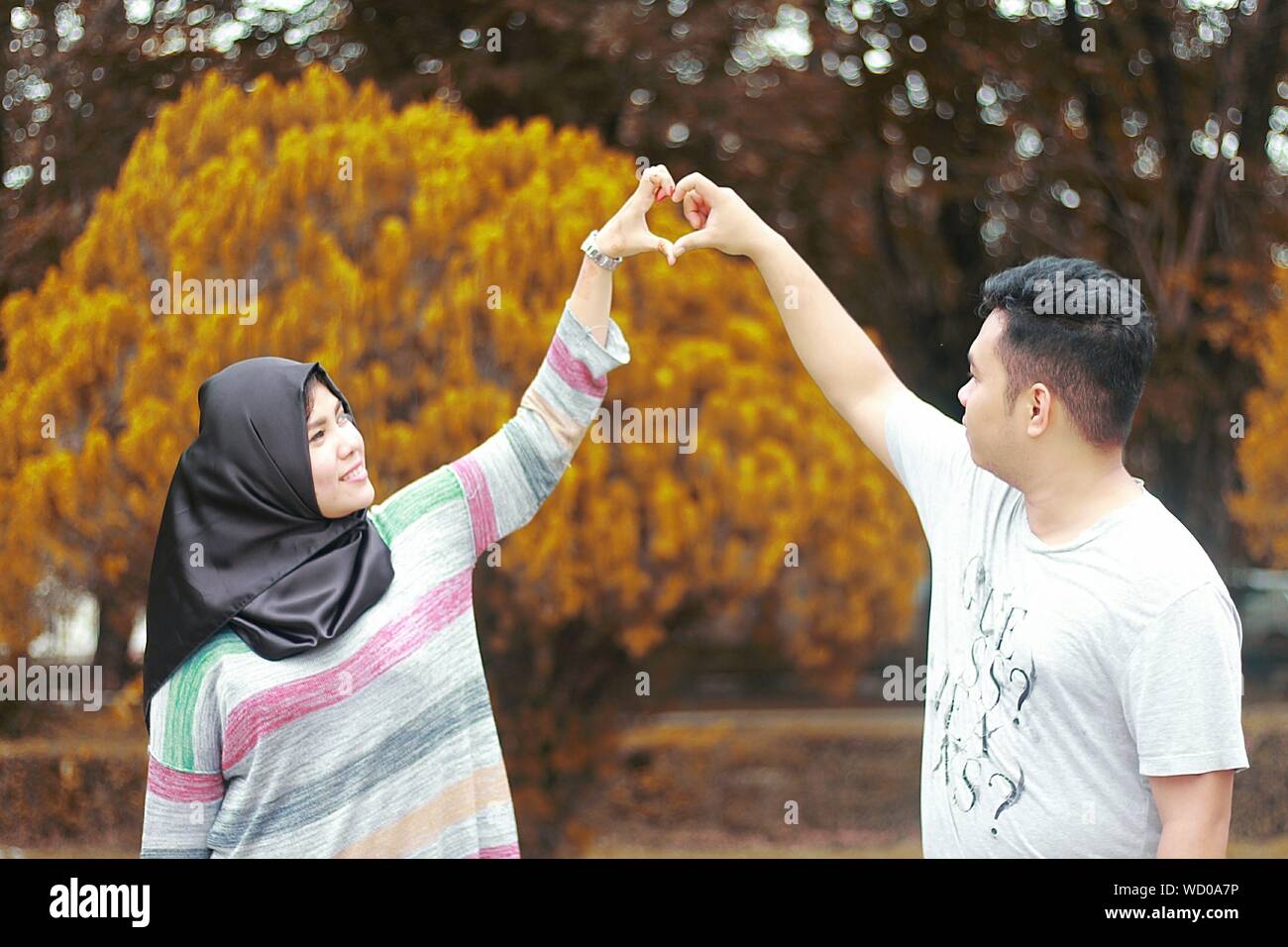 Indian hands making heart shape hi-res stock photography and images - Alamy