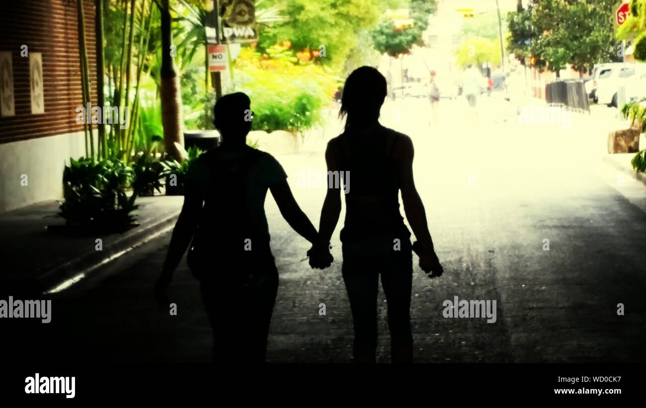 People walking together silhouette hi-res stock photography and images ...