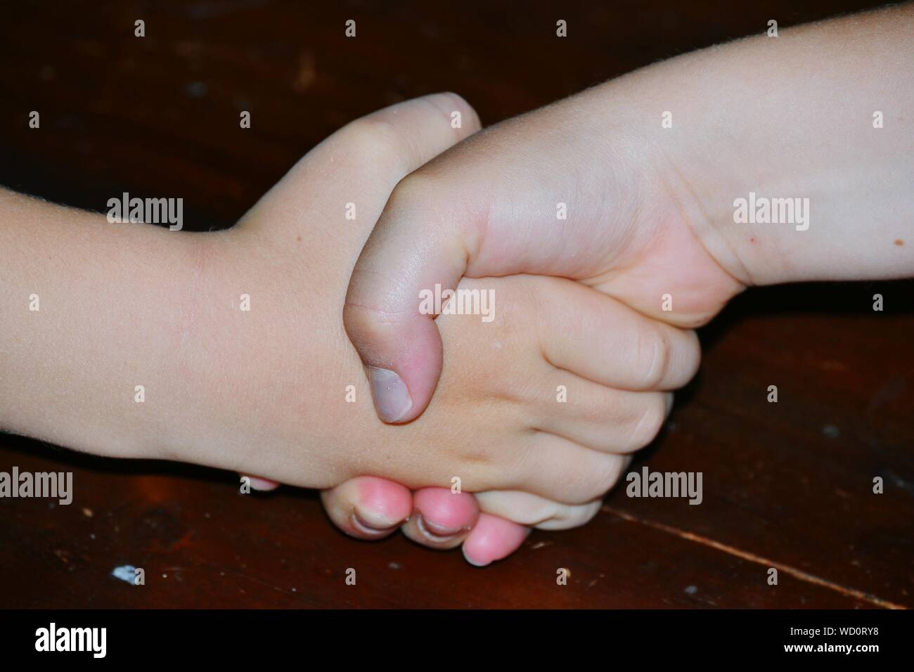 Child Shaking Hands High Resolution Stock Photography and Images - Alamy