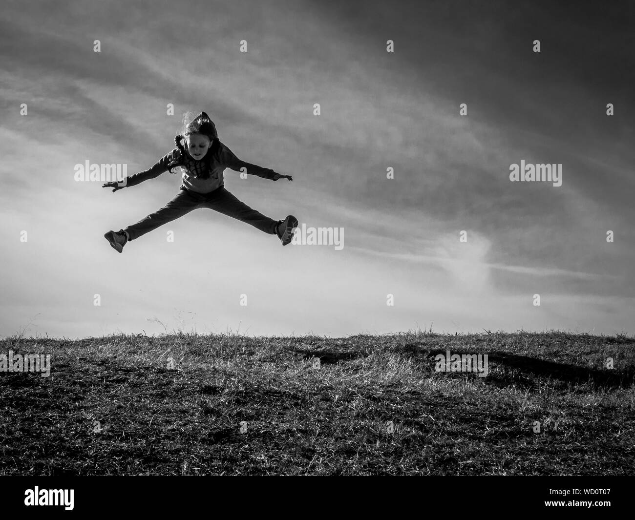 Girl jumping air hi-res stock photography and images - Alamy