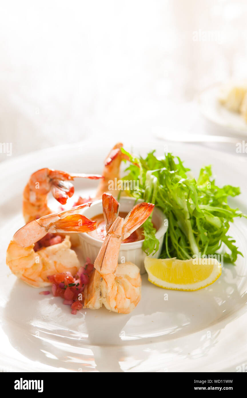 Fancy shrimp cocktail appetizer in a restaurant setting Stock Photo - Alamy