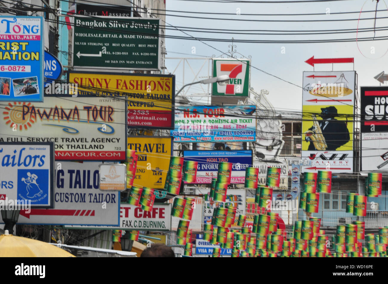 Commercial Signs On Buildings In City Stock Photo - Alamy