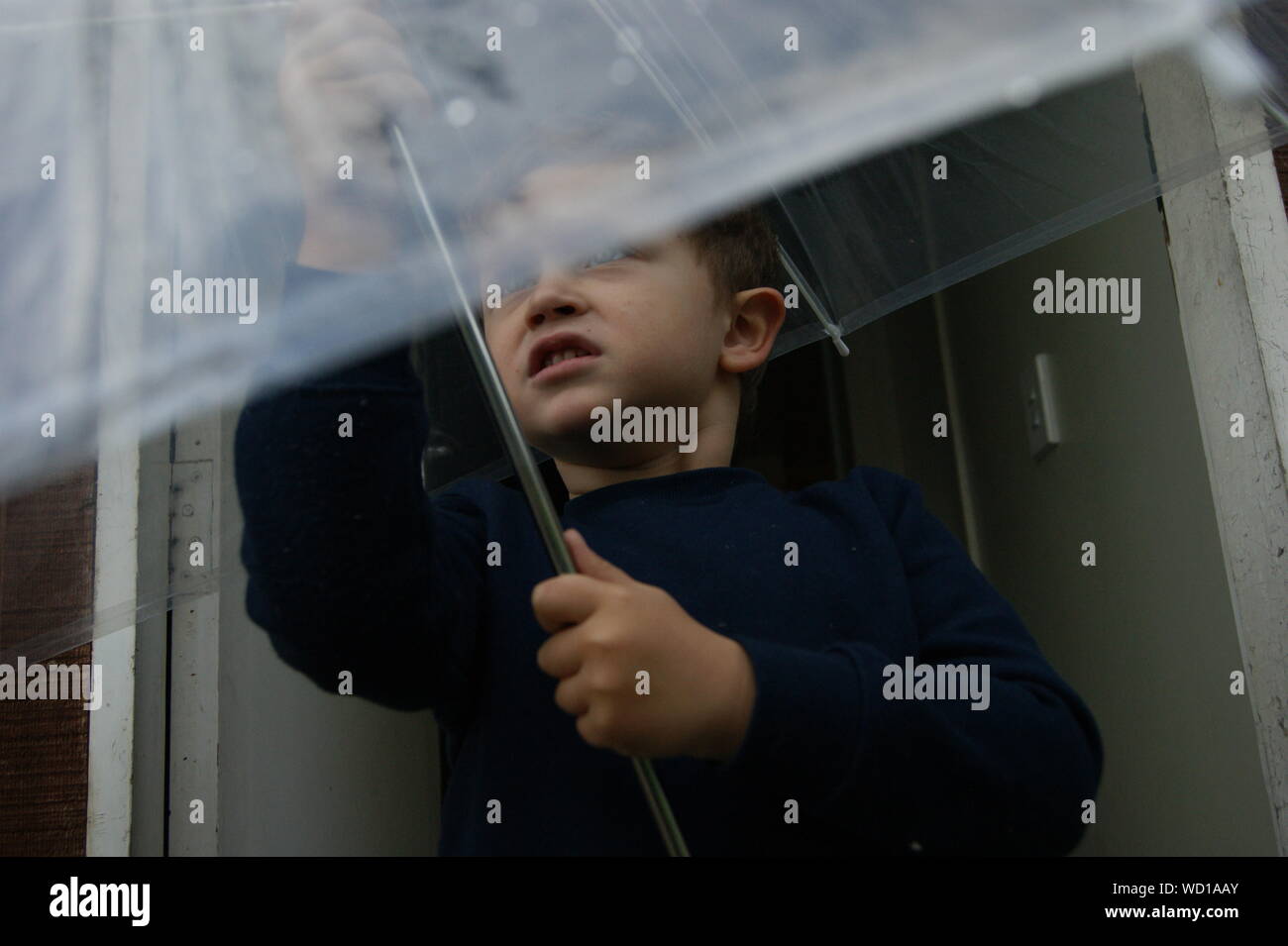 Opening an umbrella hi-res stock photography and images - Alamy