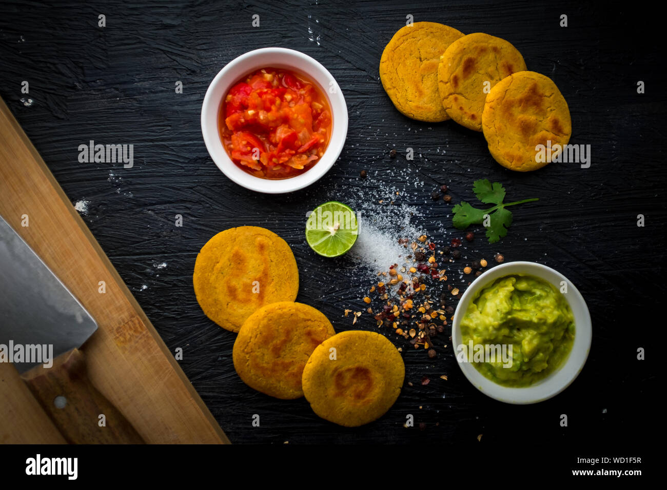 Ingredients and Preparation of Typical Colombian Food: Arepas with two ...