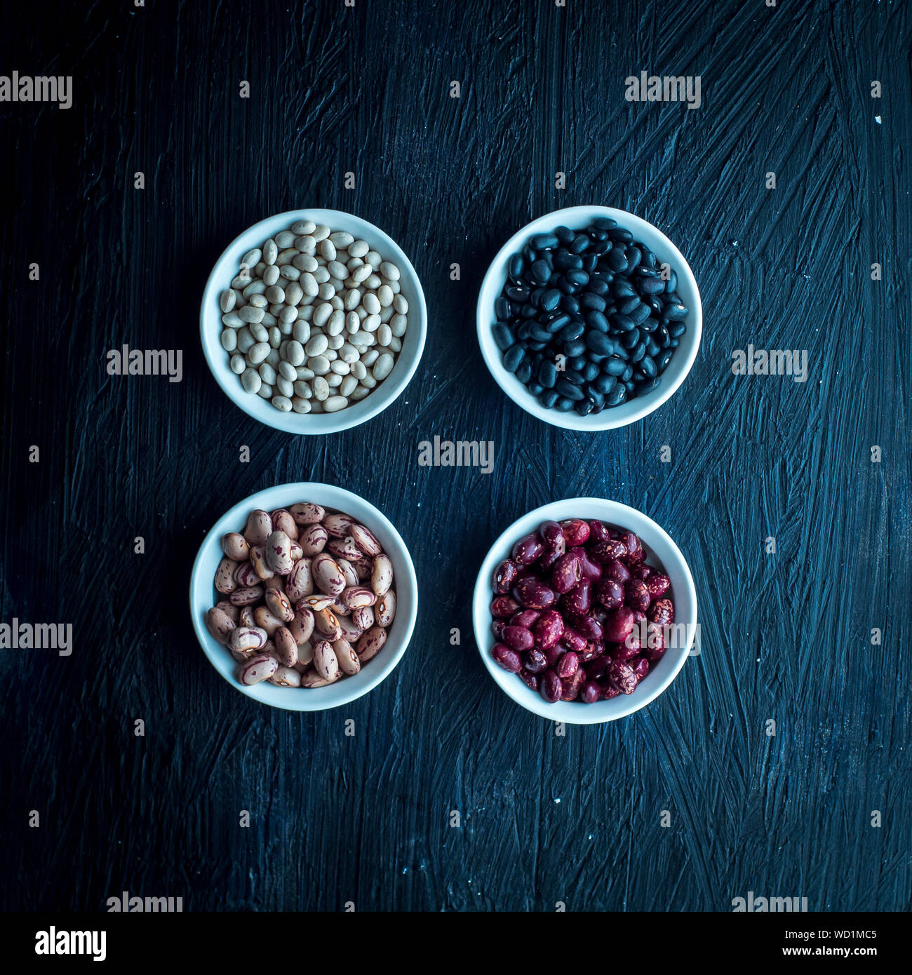 Beans of Different Colors, in Bowls Each Group, on a Black Background ...