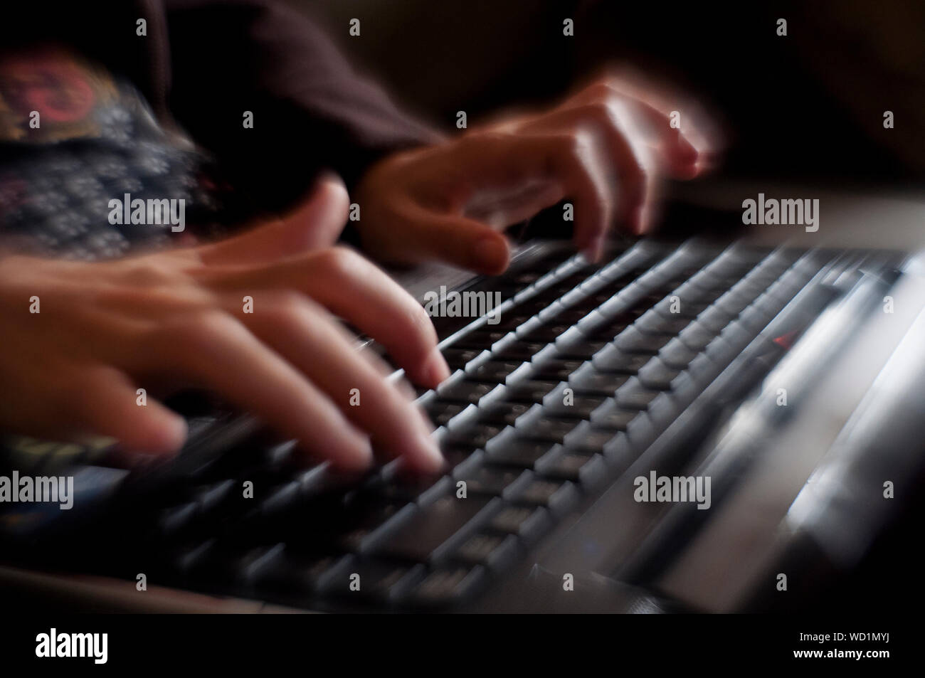 Typing computer keyboard laptop blurred hi-res stock photography and ...