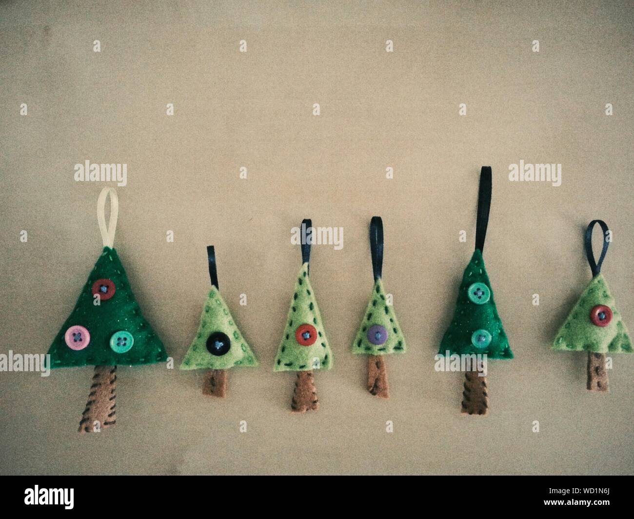 Row of christmas trees hi-res stock photography and images - Alamy