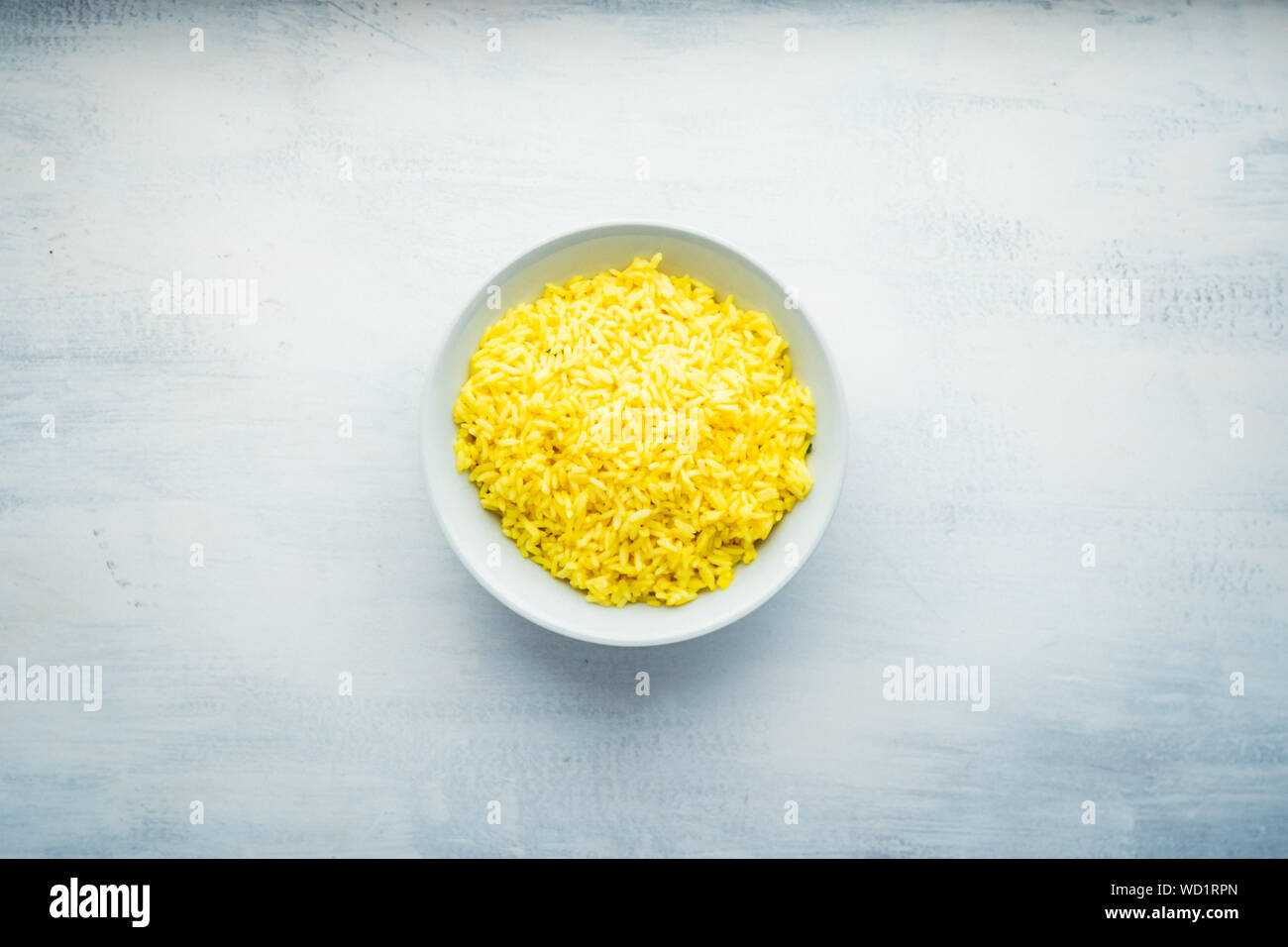 Indian Food: Yellow Rice Bowl on a White Background Stock Photo - Alamy