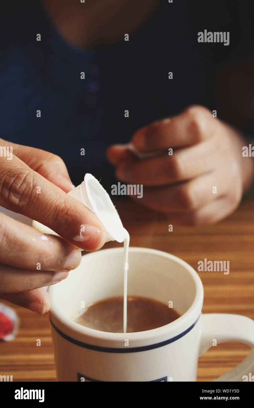 Milk mixing into tea hi-res stock photography and images - Alamy