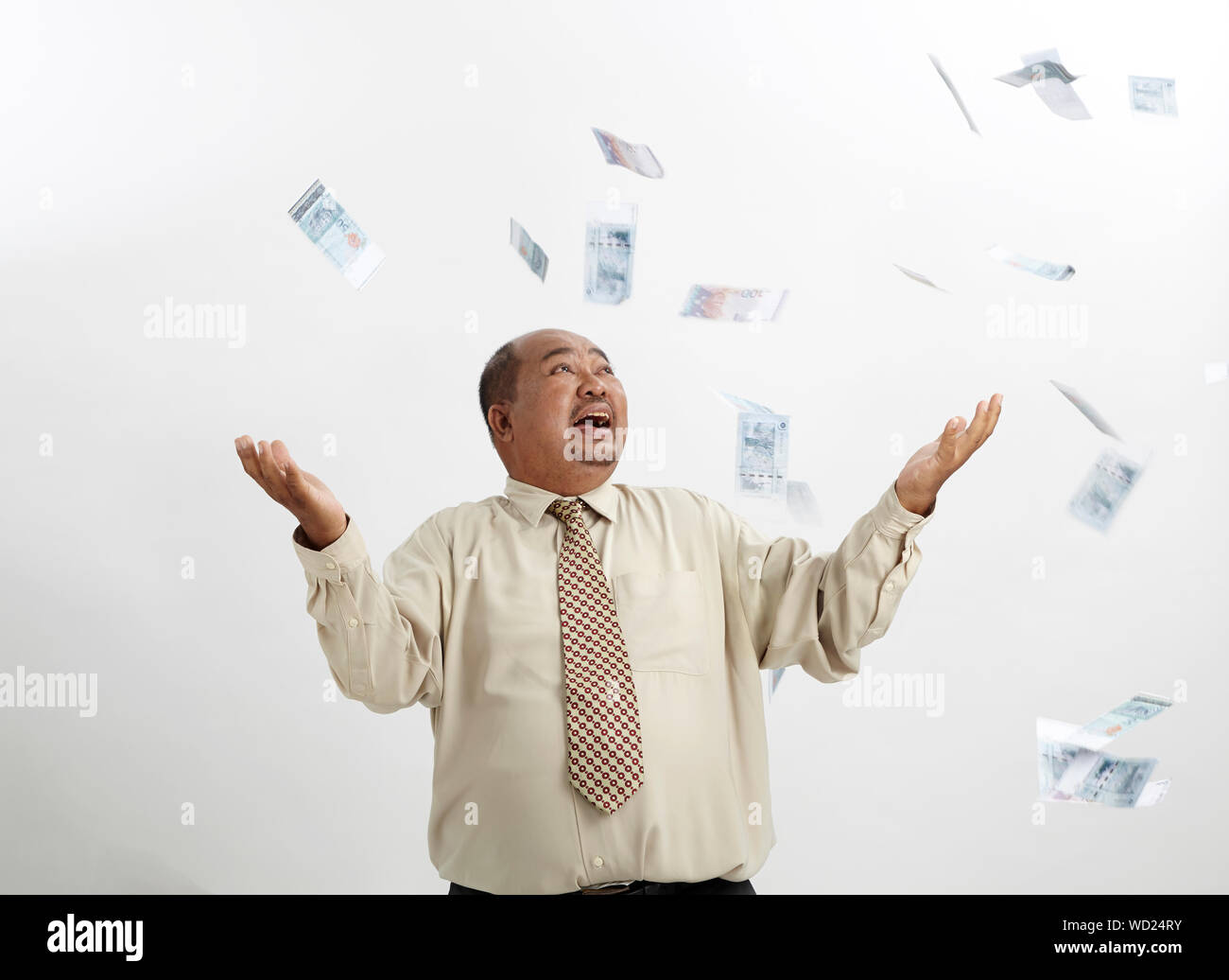 Businessman throwing money hi-res stock photography and images - Alamy