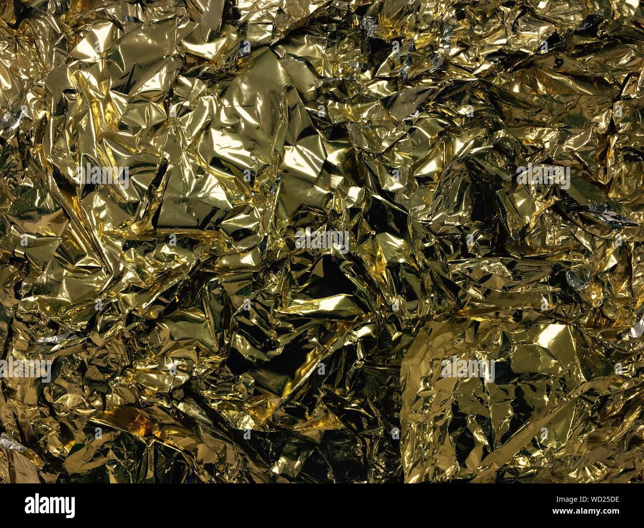 Gold paper wrapping hi-res stock photography and images - Alamy