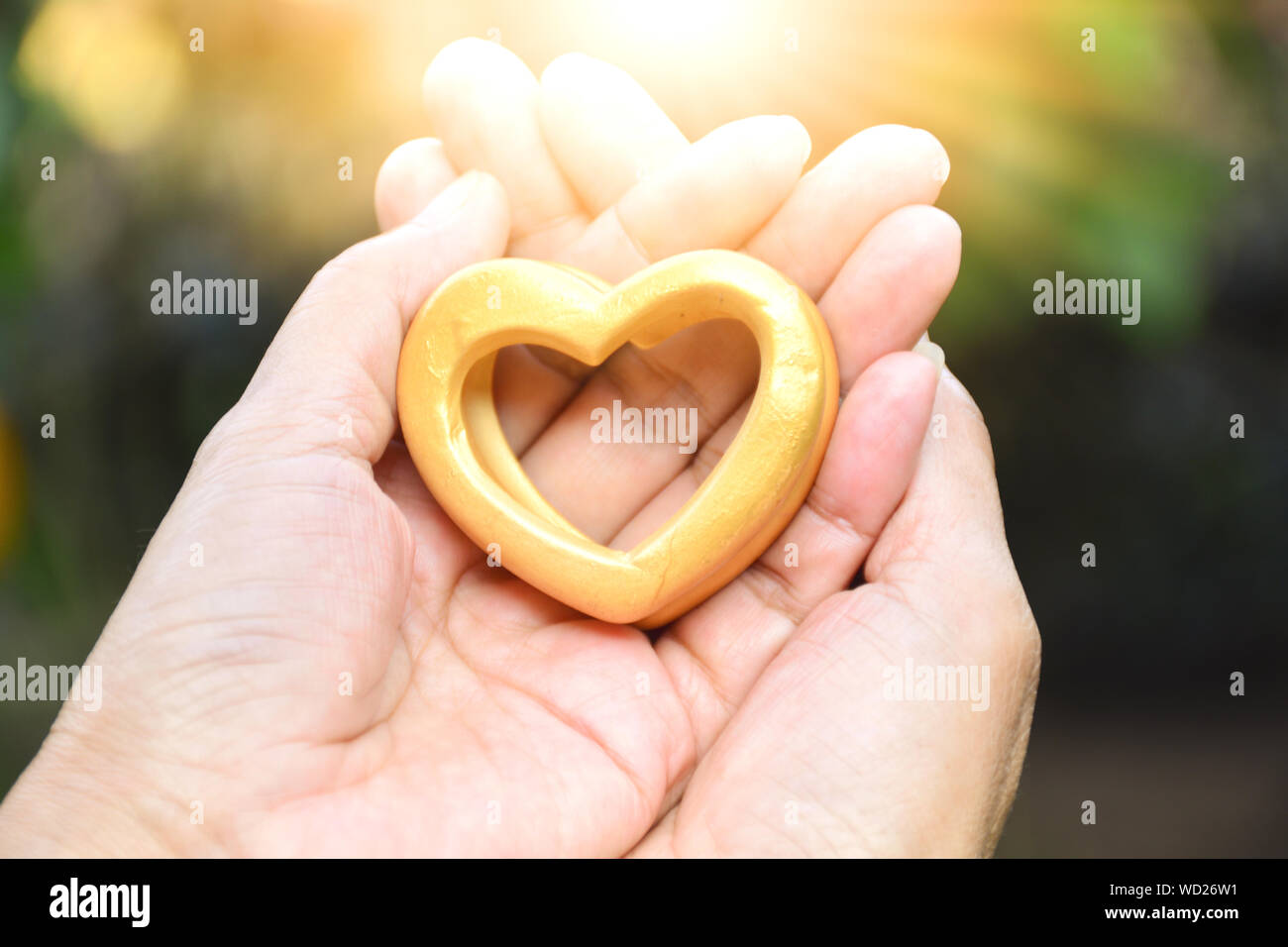 Food holding hands hi-res stock photography and images - Alamy